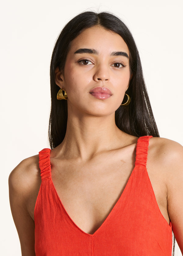 Combinaison en lin orange à bretelles élastiques - La Fée Maraboutée